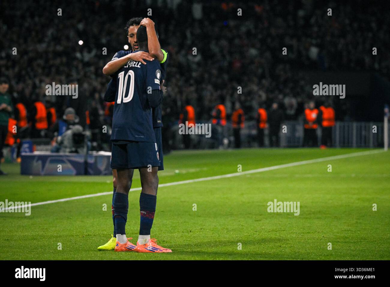 Paris Saint-Germain’s defender Marquinhos hugs Paris Saint-Germain’s ...