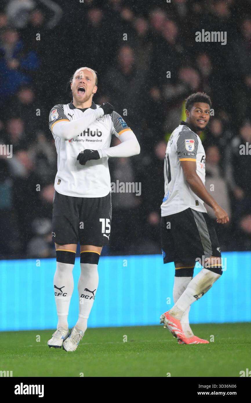 Derby County's Lars-Jorgen Salvesen (left) celebrates scoring his sides ...
