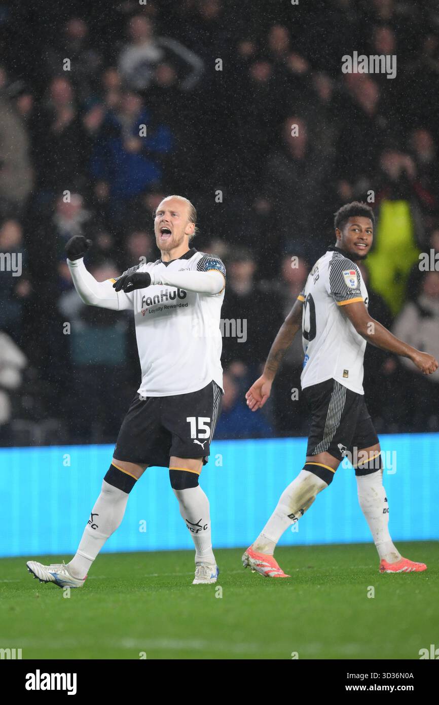 Derby County's Lars-Jorgen Salvesen (left) celebrates scoring his sides ...