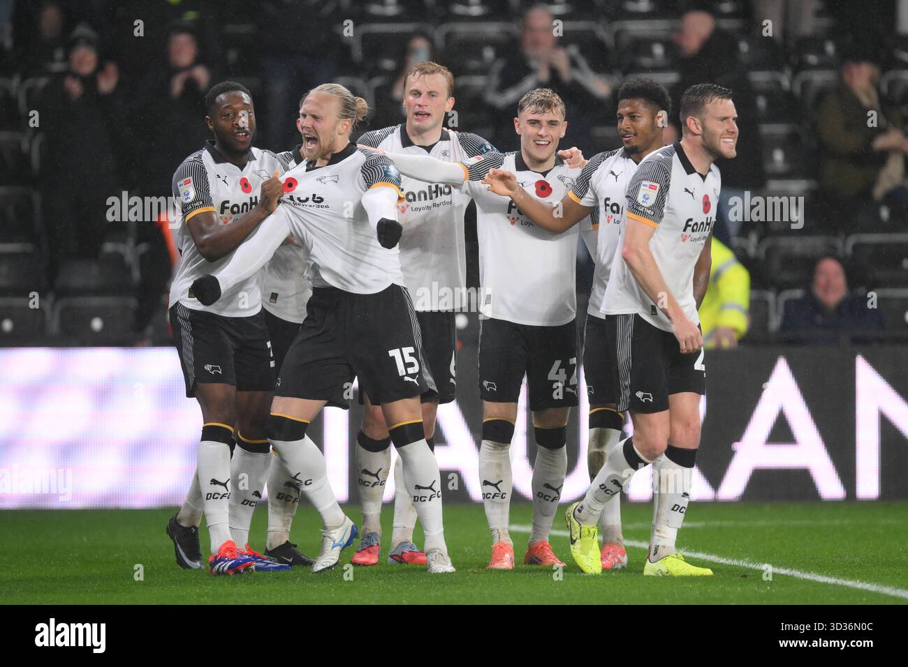 Derby County's Lars-Jorgen Salvesen (second left) celebrates scoring ...