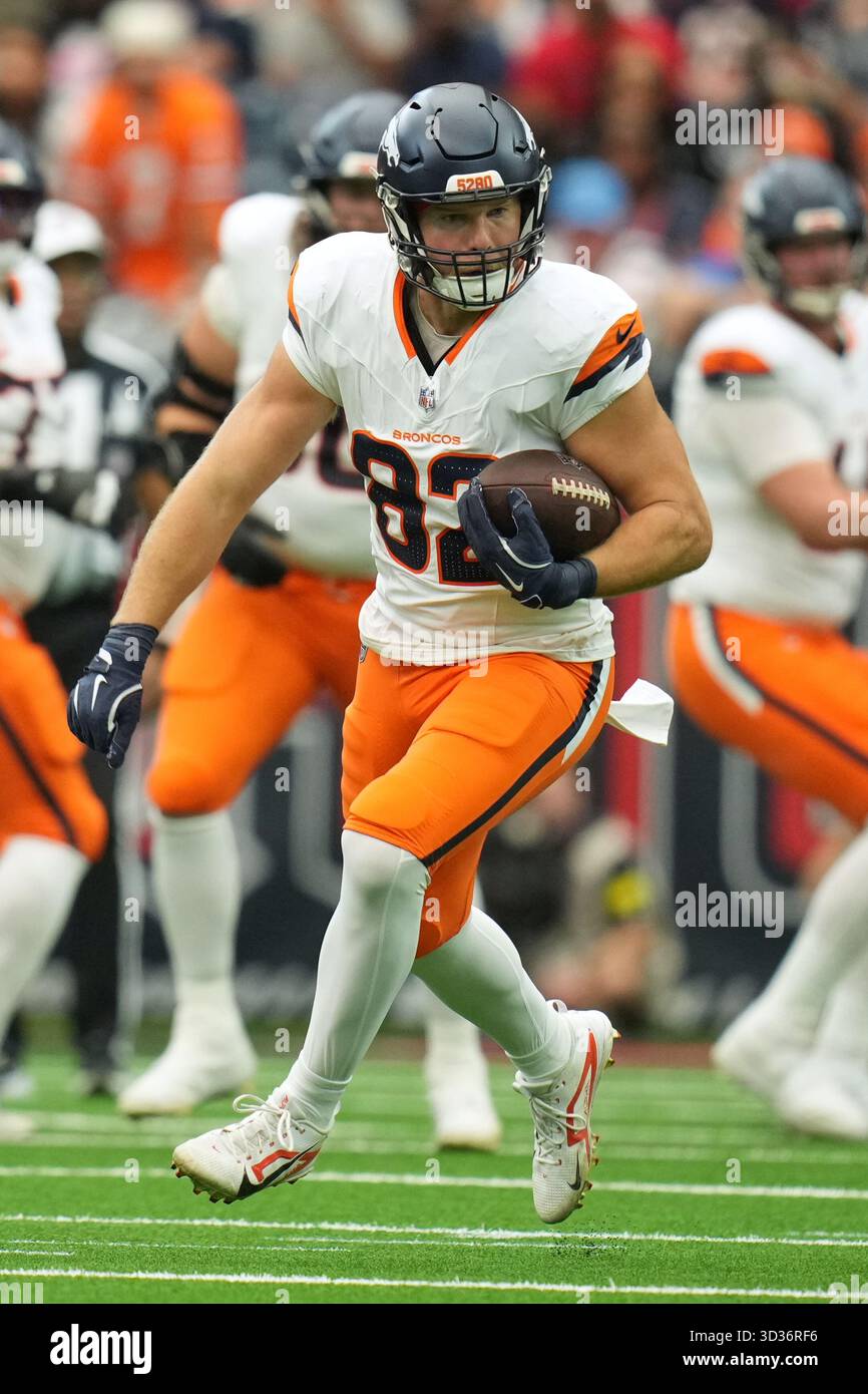 Denver Broncos tight end Adam Trautman (82) runs against the Houston ...