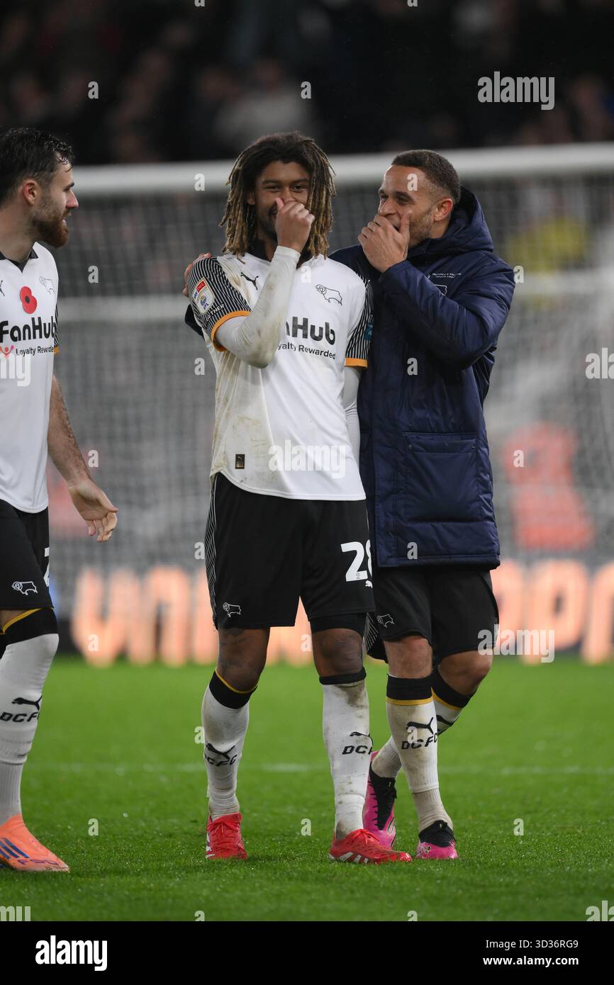 Derby County's Dion Sanderson (centre) and Derby County's Carlton ...