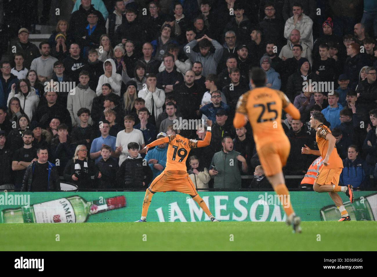 Hull City's Joel Ndala (left) celebrates scoring his sides first goal ...