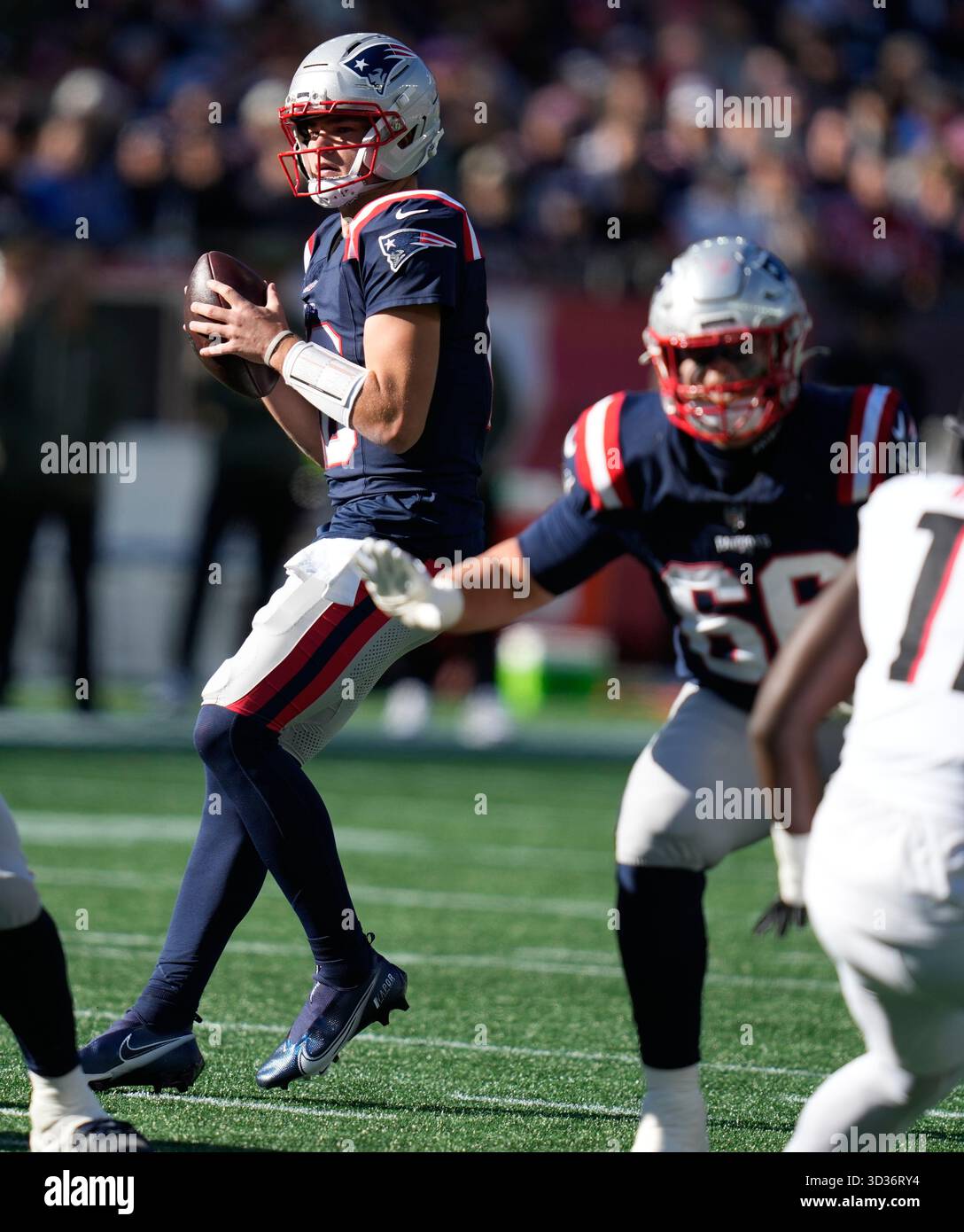 New England Patriots quarterback Drake Maye (10) looks to pass while ...