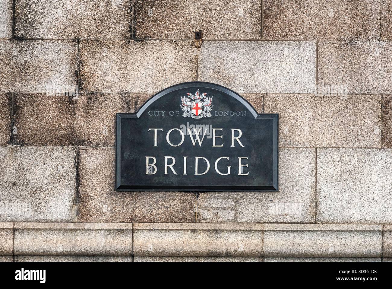 The iconic Tower Bridge sign, London, England, UK. The Bridge was built ...