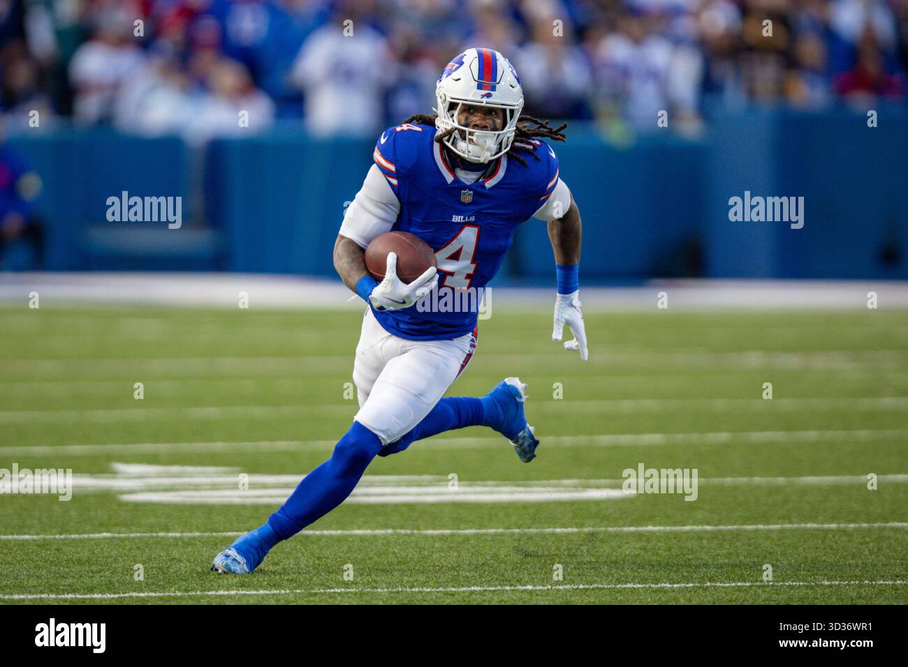 Buffalo Bills running back James Cook III (4) runs the ball during an ...