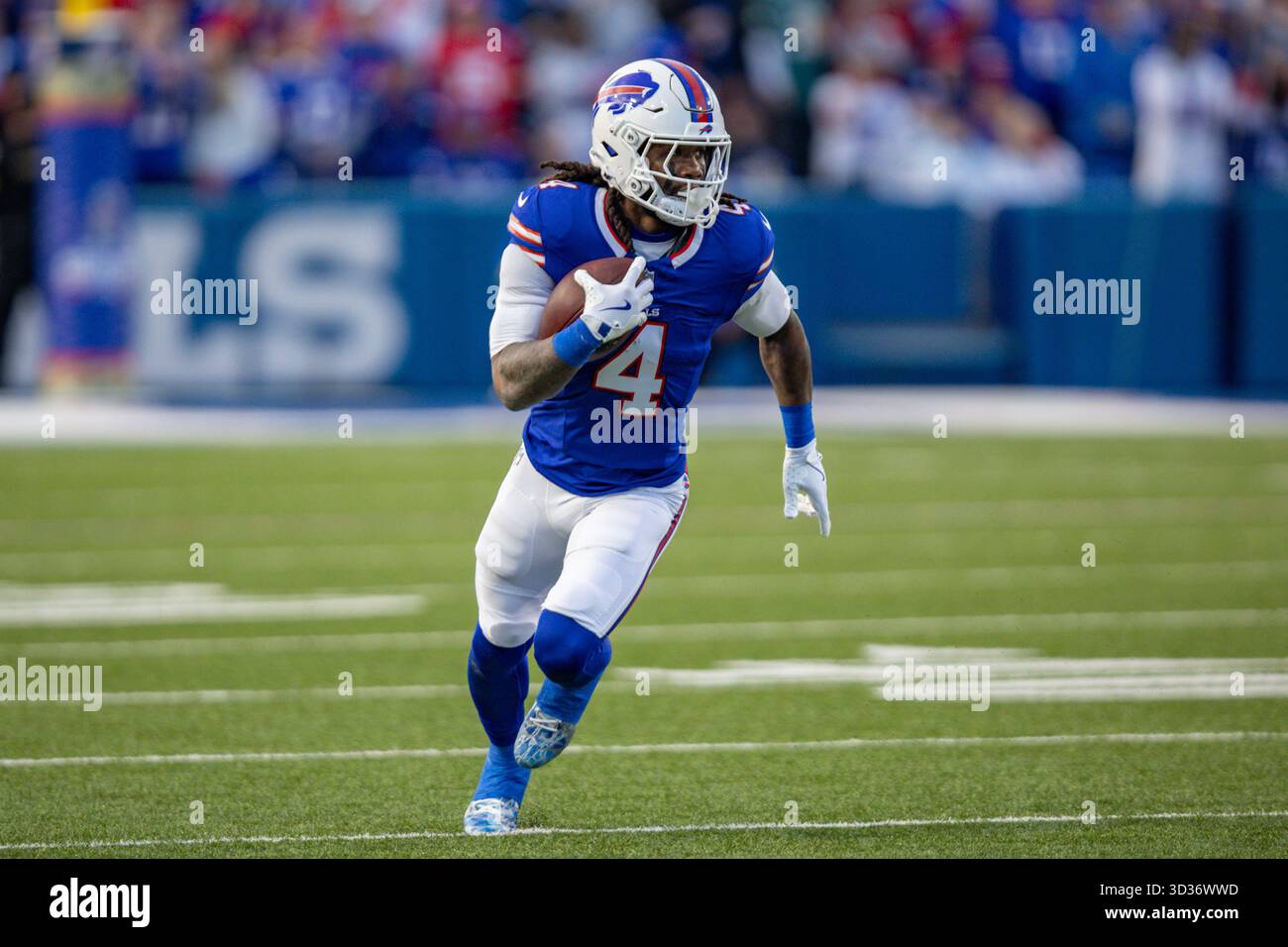 Buffalo Bills running back James Cook III (4) runs the ball during an ...