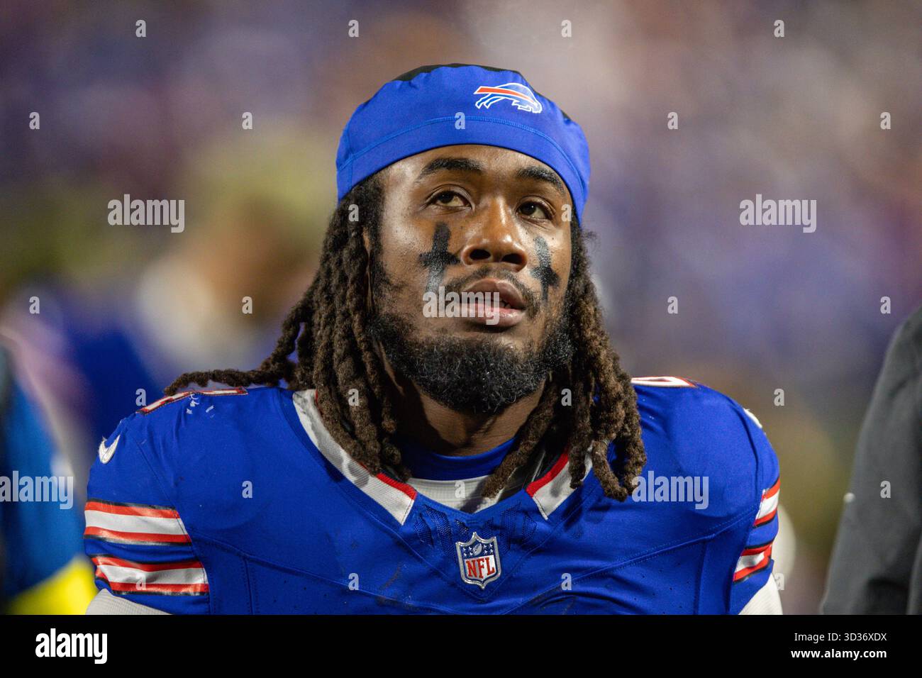 Buffalo Bills running back James Cook III (4) walks the sideline during ...