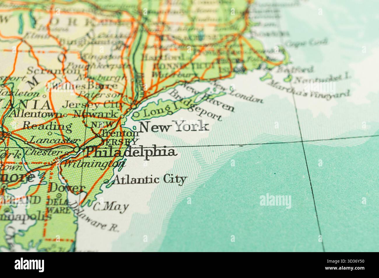 Close-up vintage road map section highlighting northeastern US, with ...