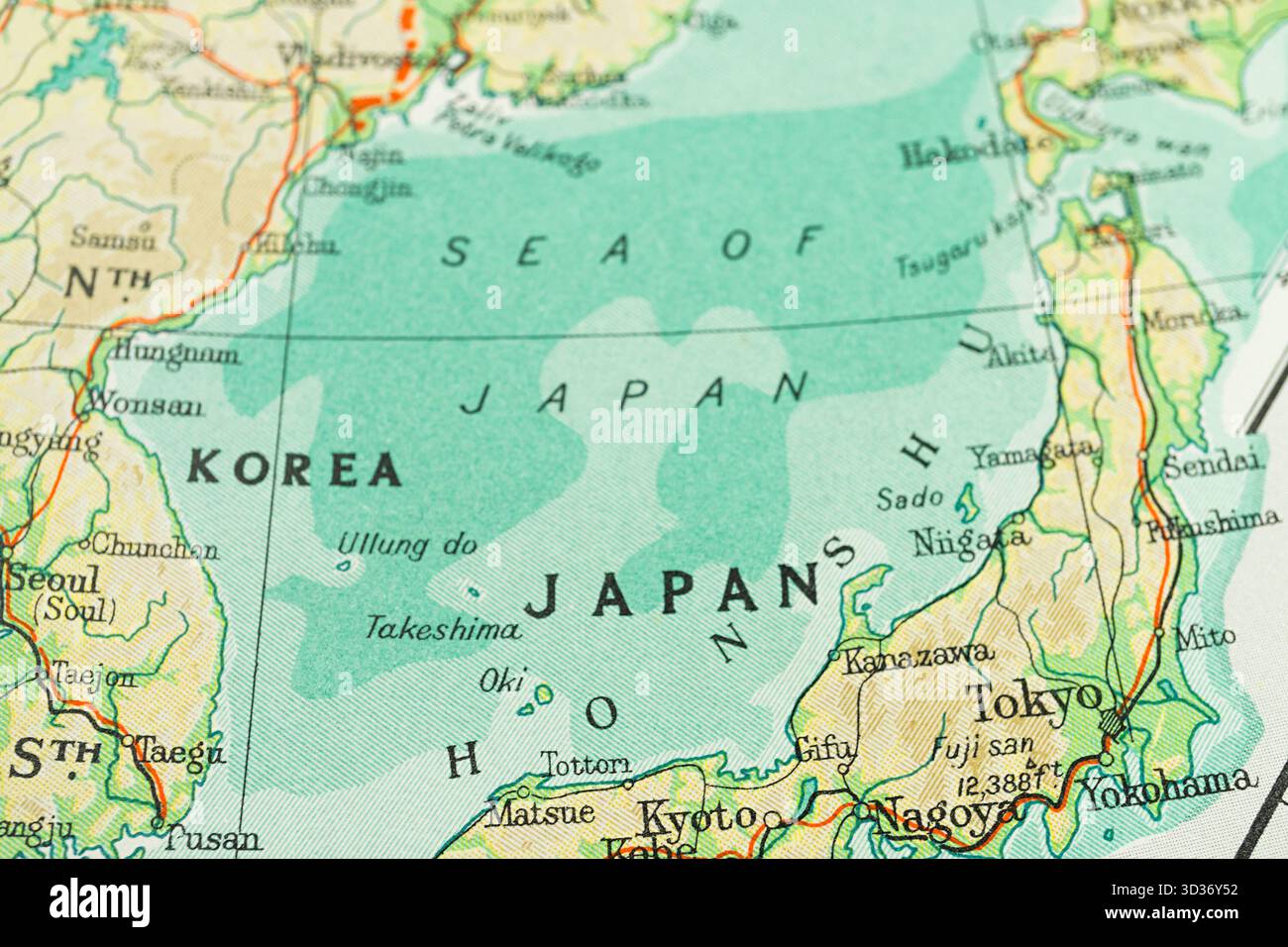 This image presents a map of Japan with labeled major islands Honshu ...