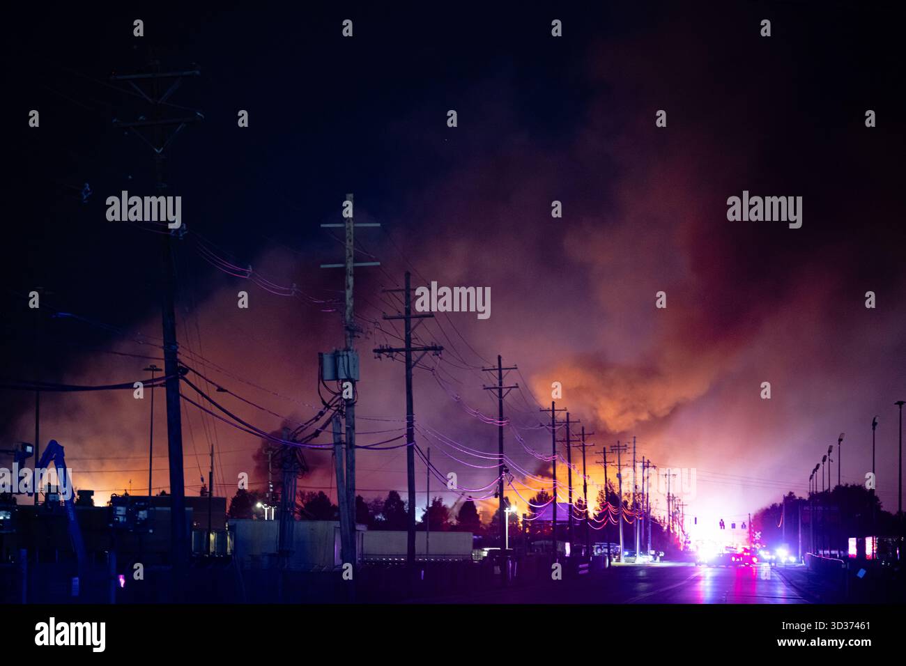 Plums of smoke rise from the area after a UPS cargo plane crashed and ...