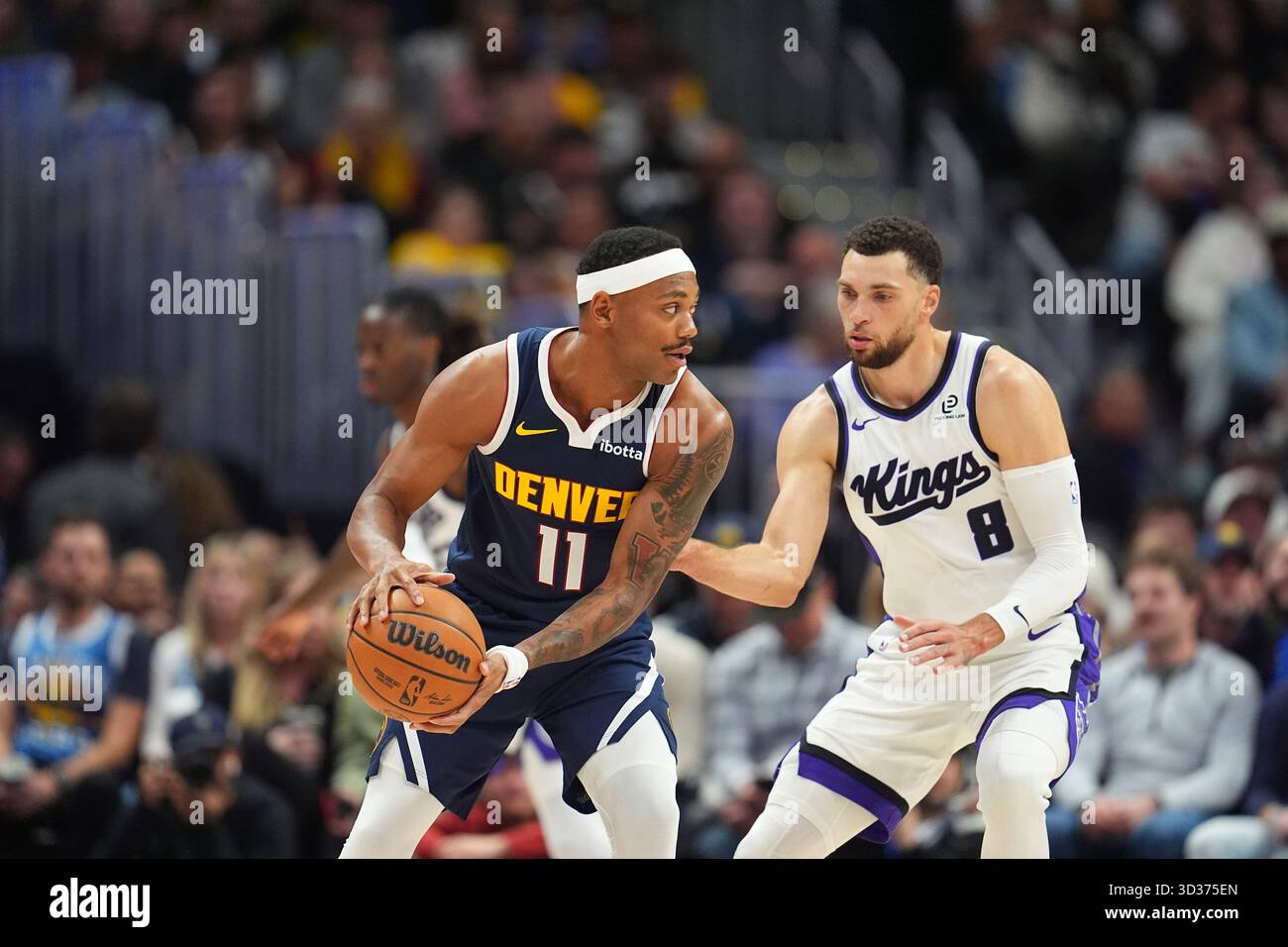 Denver Nuggets guard Bruce Brown (11) and Sacramento Kings guard Zach ...