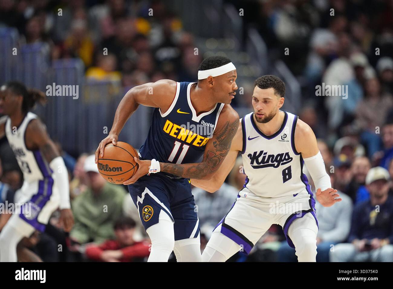 Denver Nuggets guard Bruce Brown (11) and Sacramento Kings guard Zach ...