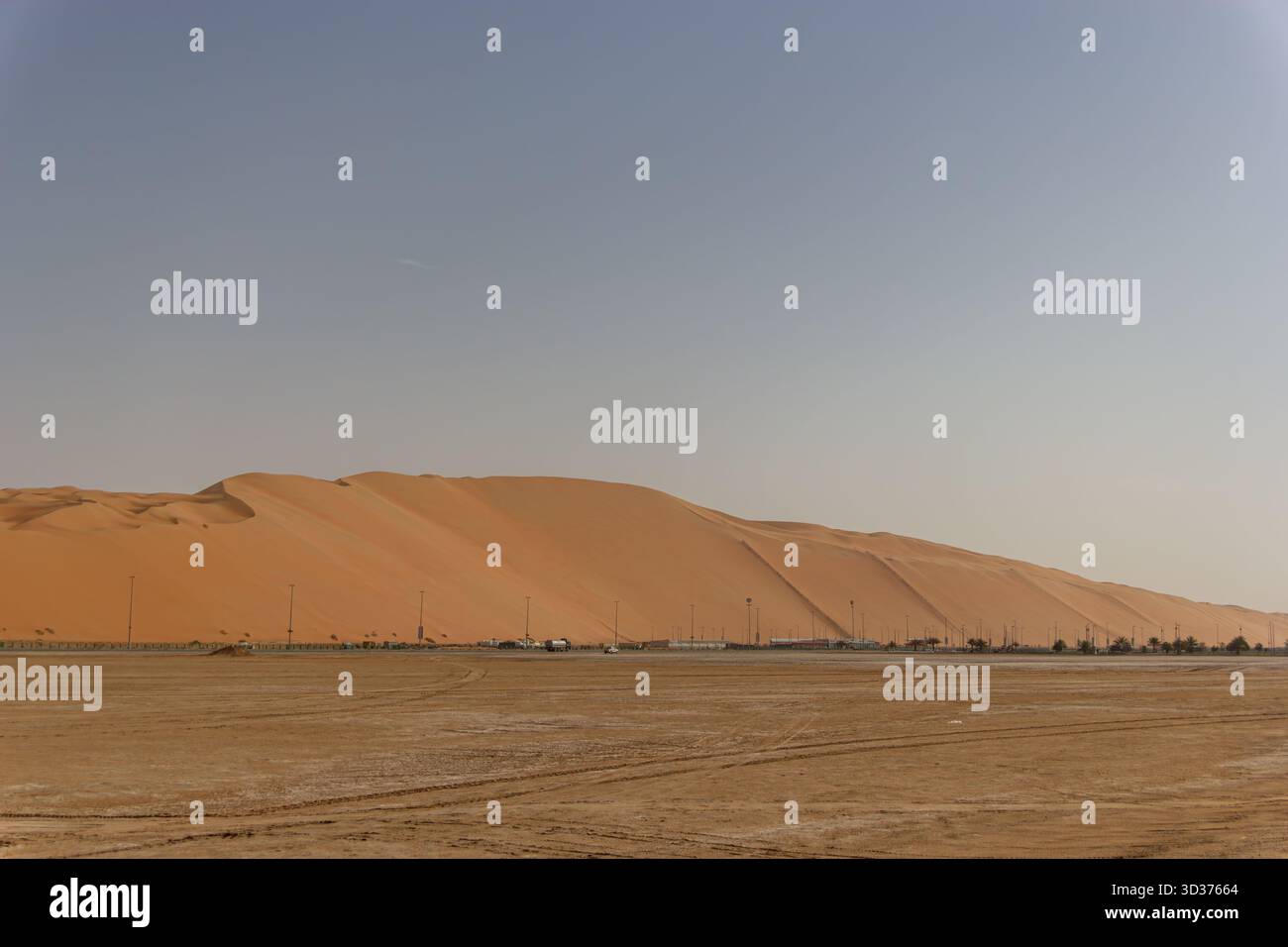 The massive, steep sand slope of Moreeb Dune Stock Photo - Alamy