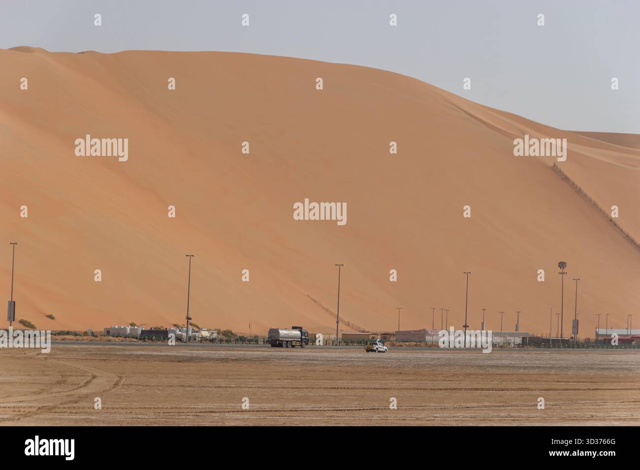 The massive, steep sand slope of Moreeb Dune Stock Photo - Alamy