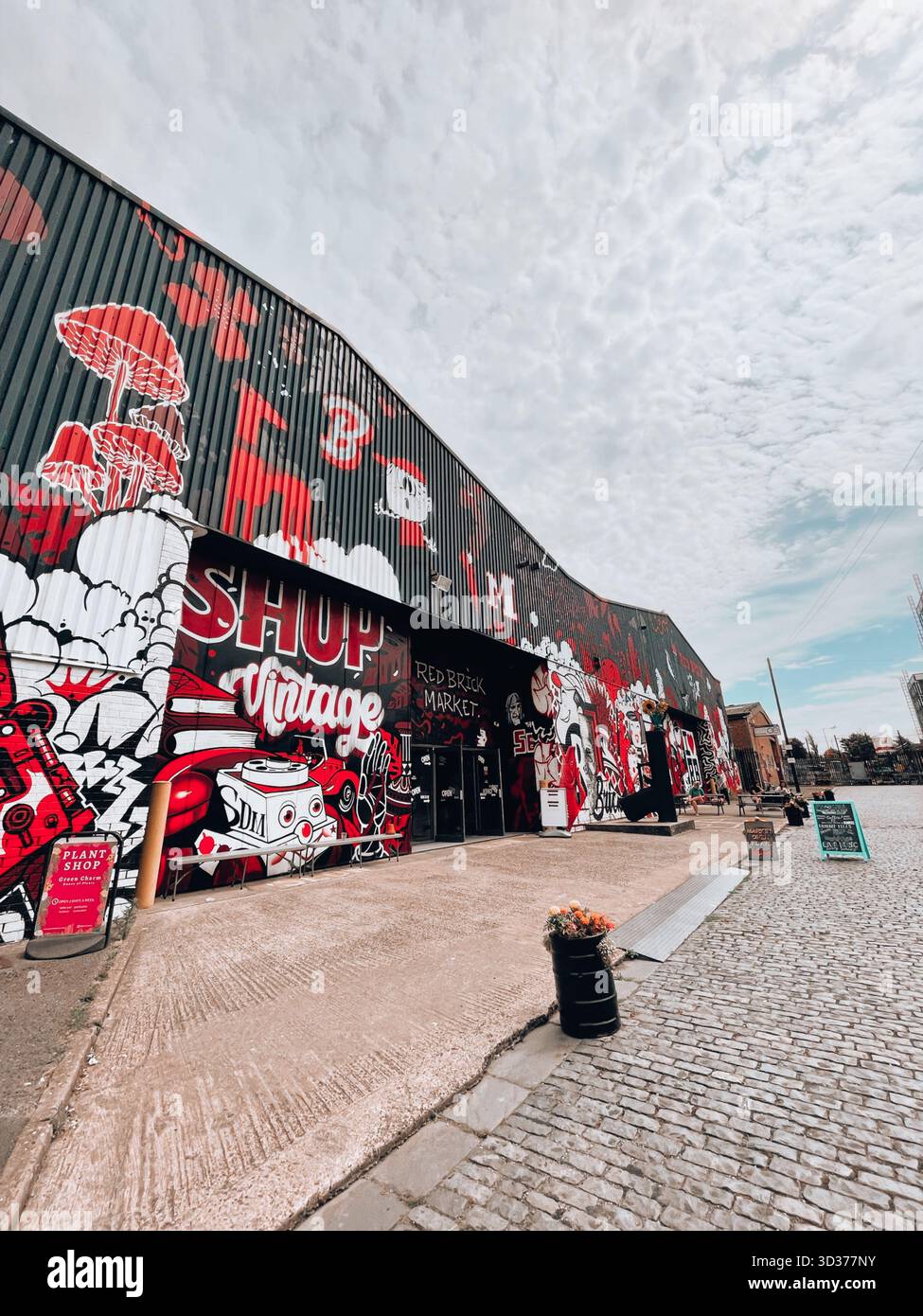 Colorful graffiti on the exterior walls of Red Brick Market in ...