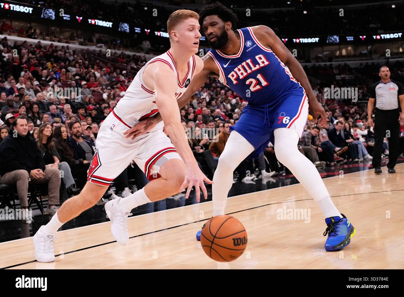 Chicago Bulls guard/forward Kevin Huerter, left, drives as Philadelphia ...