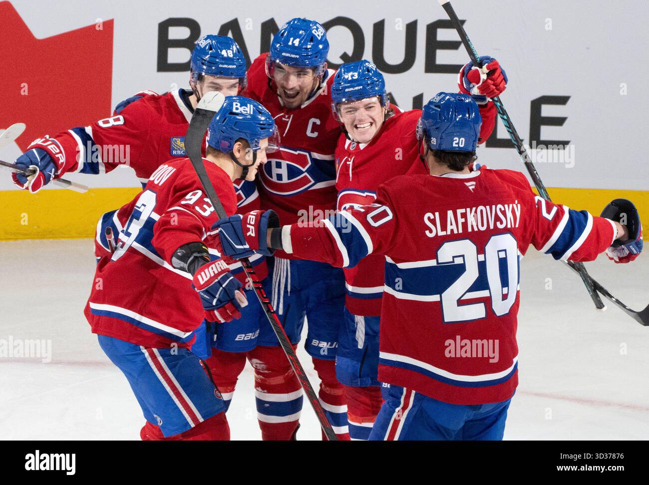 Montreal Canadiens' Nick Suzuki (14) celebrates his goal over ...