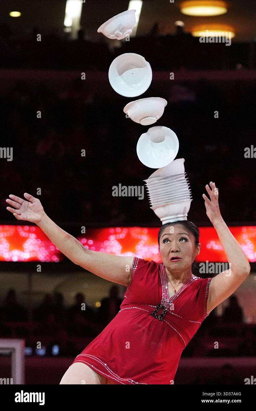 Red Panda performs in the halftime during an NBA basketball game ...