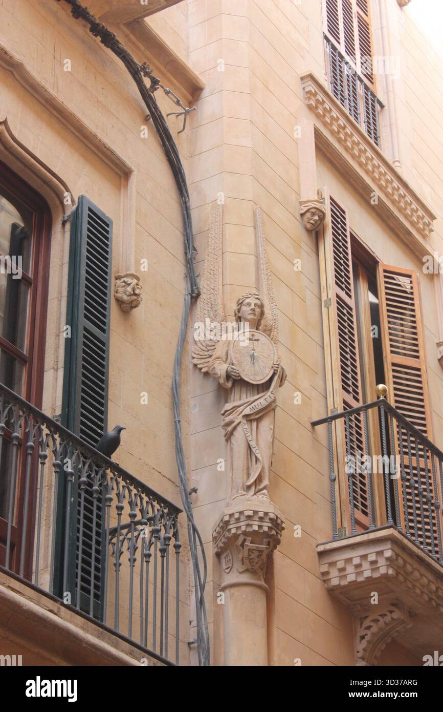 Statue on a building on Carrer de la Portella in Palma de Mallorca ...