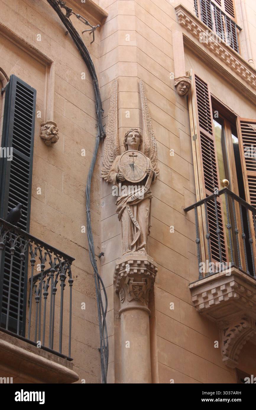 Statue on a building on Carrer de la Portella in Palma de Mallorca ...