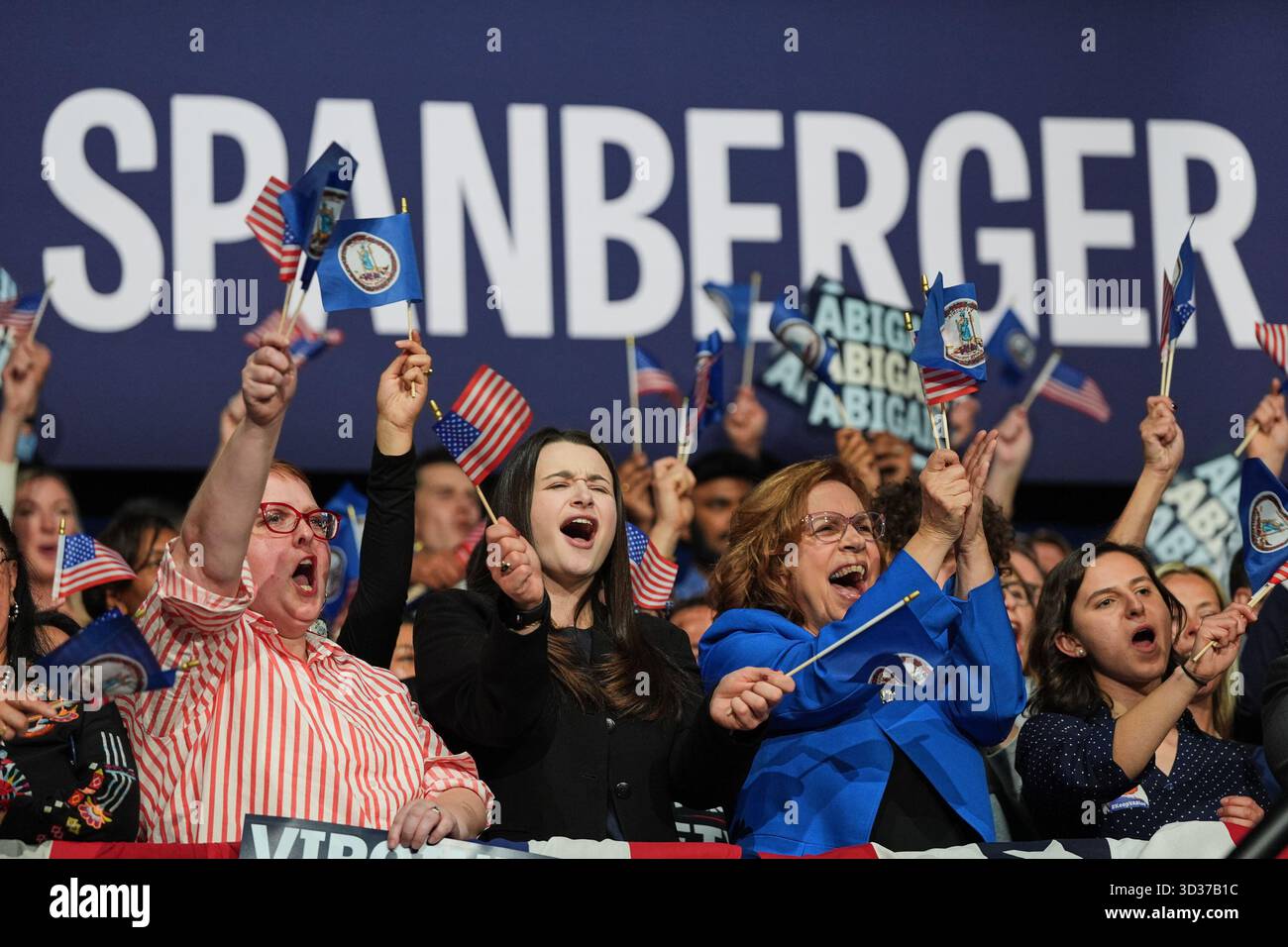 People cheer as Democrat Abigail Spanberger speaks on stage after she ...