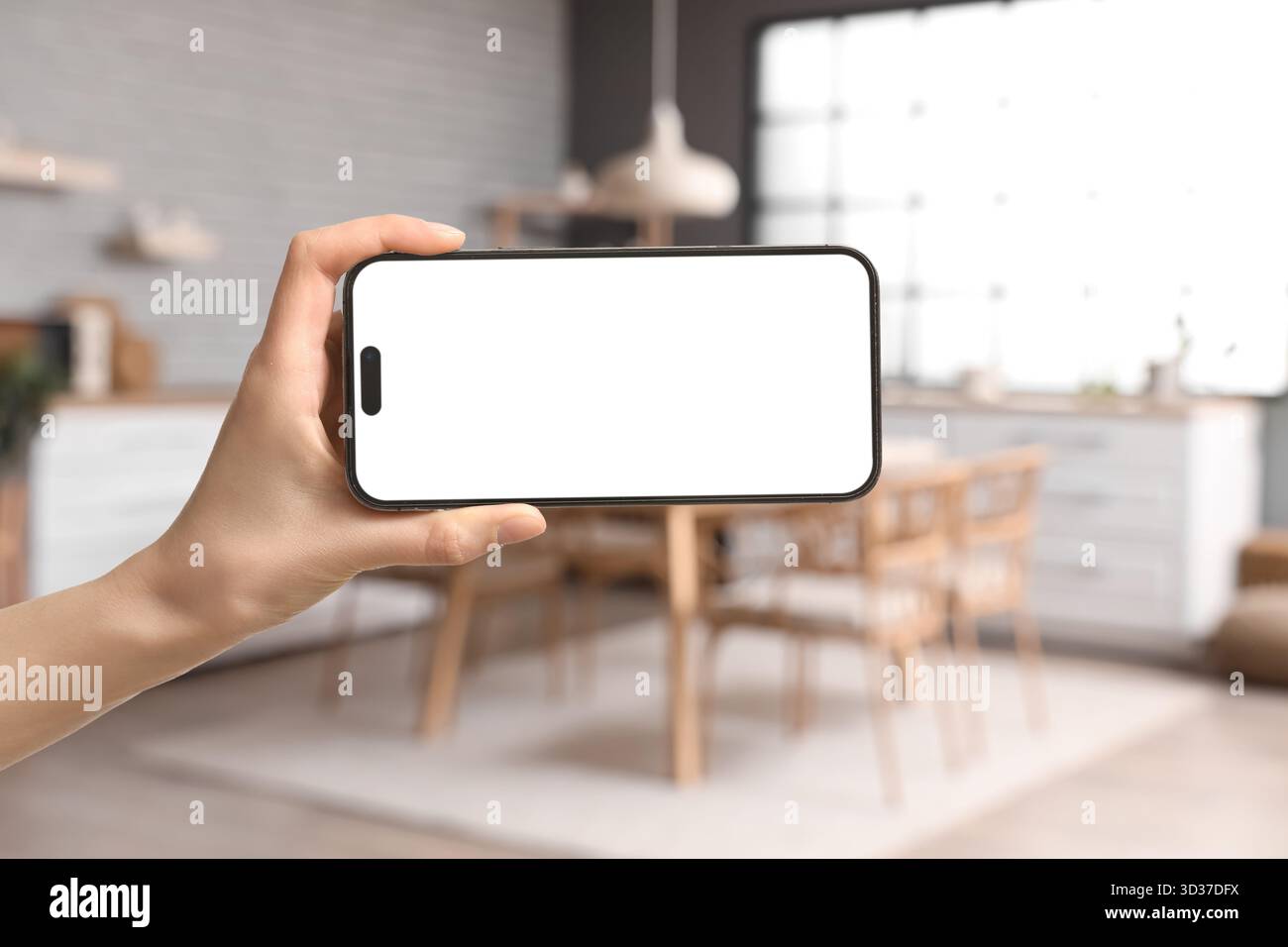 Kitchen table with blank screen smartphone hi-res stock photography and ...