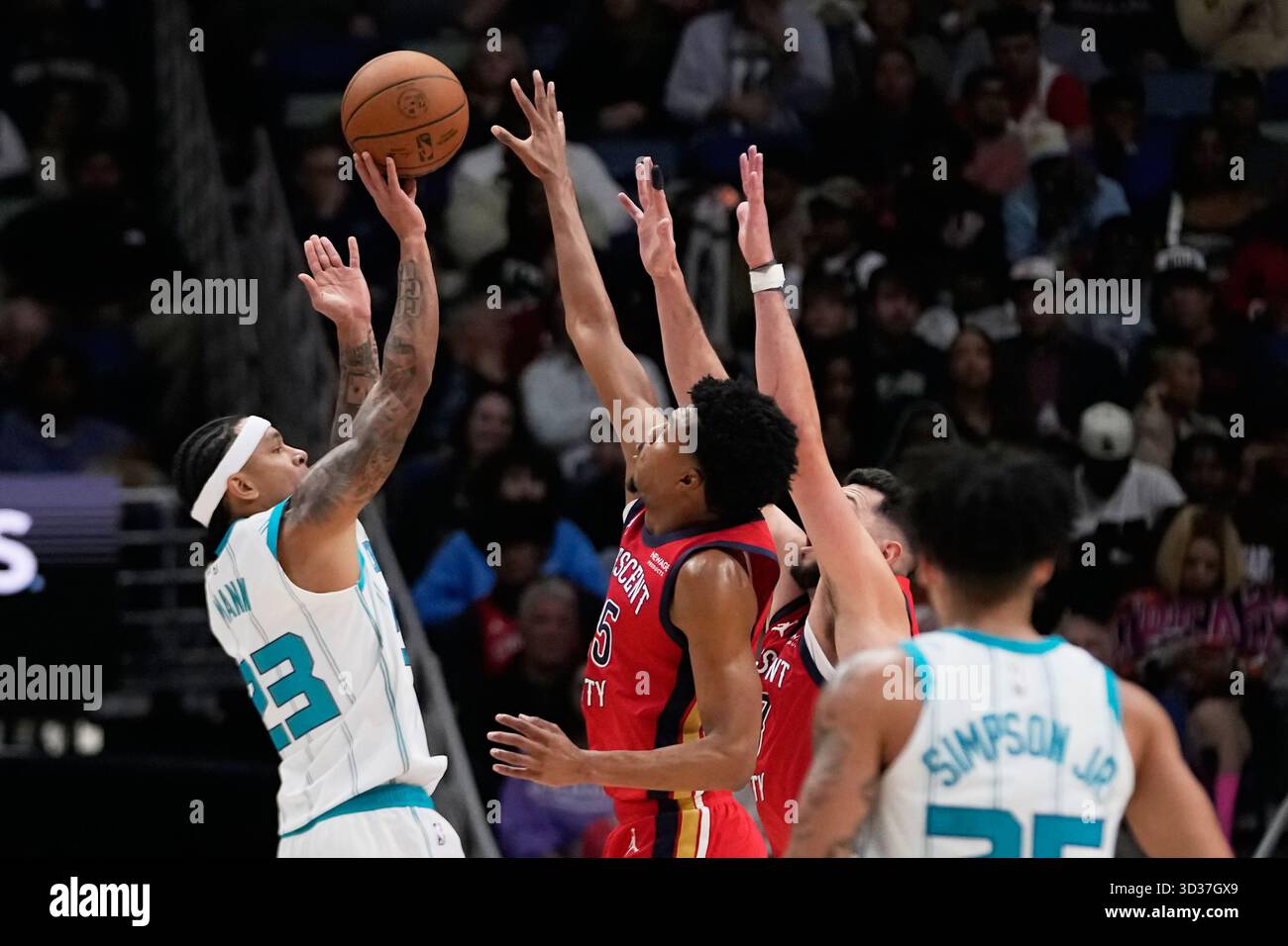 Charlotte Hornets guard Tre Mann (23) shoots against New Orleans ...