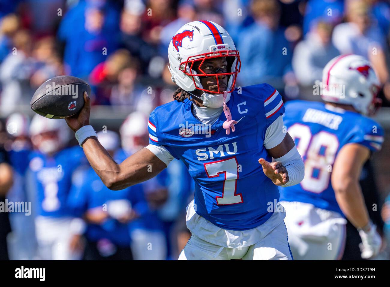 SMU quarterback Kevin Jennings throws a pass during an NCAA college ...