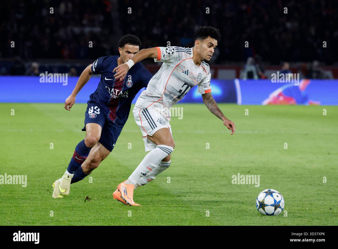 PSG’s Warren Zaire-Emery battles Bayern Munich’s Luis Diaz during the ...