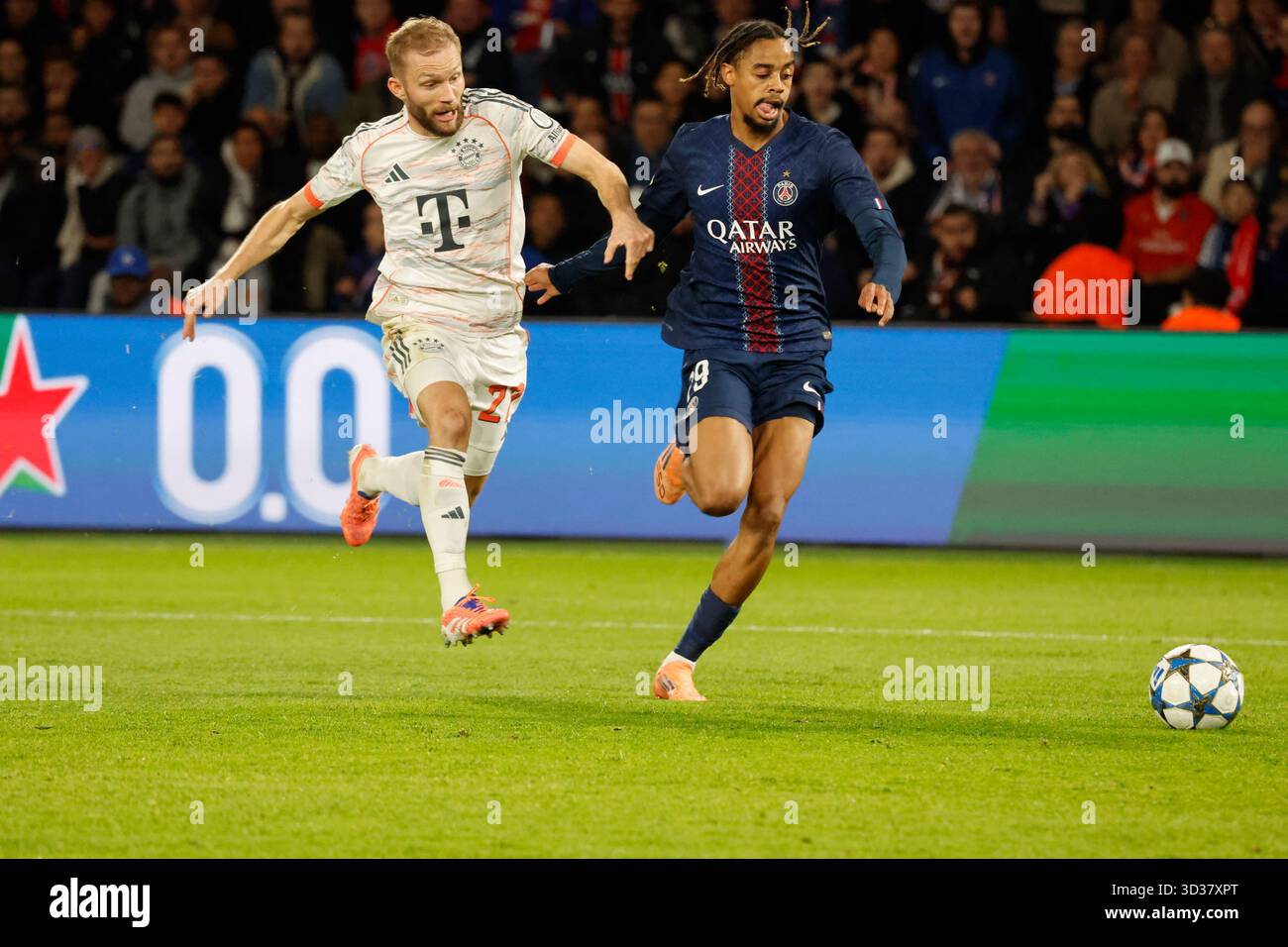 PSG’s Bradley Barcola battles Bayern Munich’s Konrad Laimer during the ...