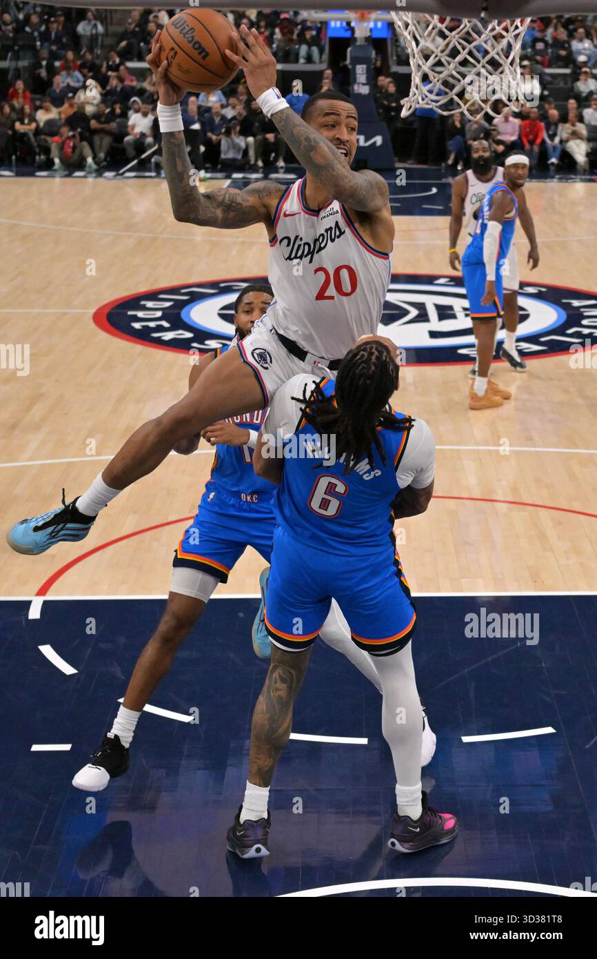 Los Angeles Clippers forward/center John Collins jumps over Oklahoma ...