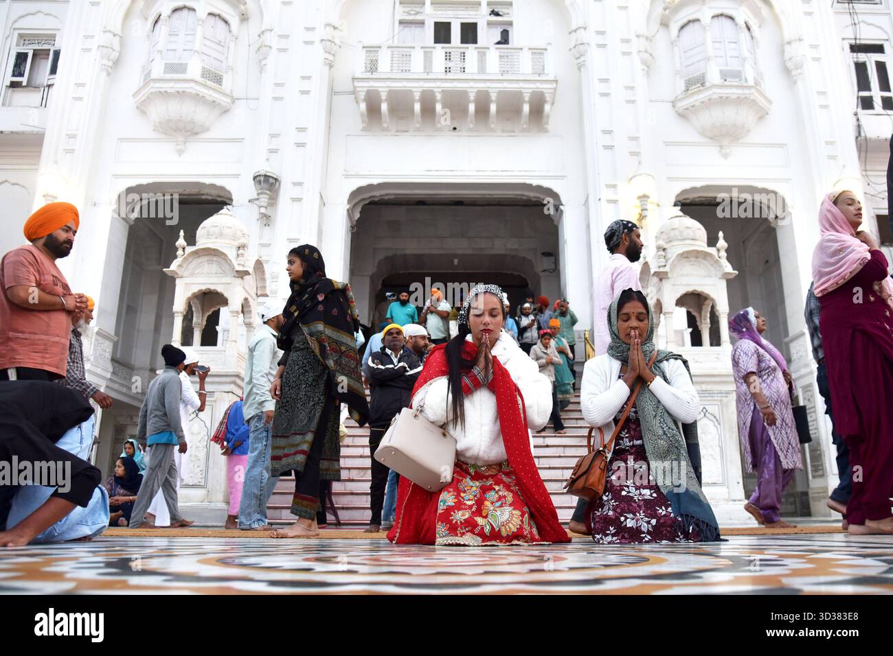 Sikh devotees pay obeisance at the Golden Temple as they mark the birth ...