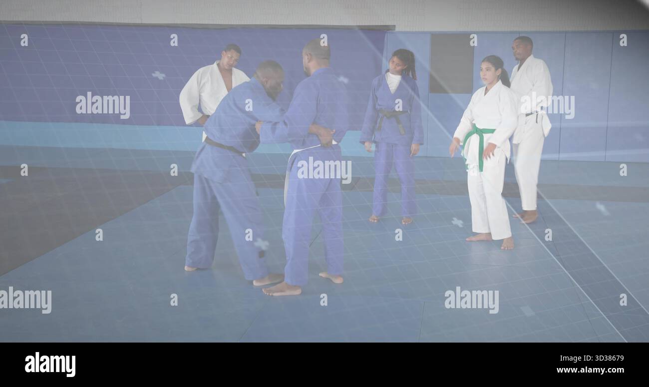 Practicing standing grappling drill two African American men in blue ...