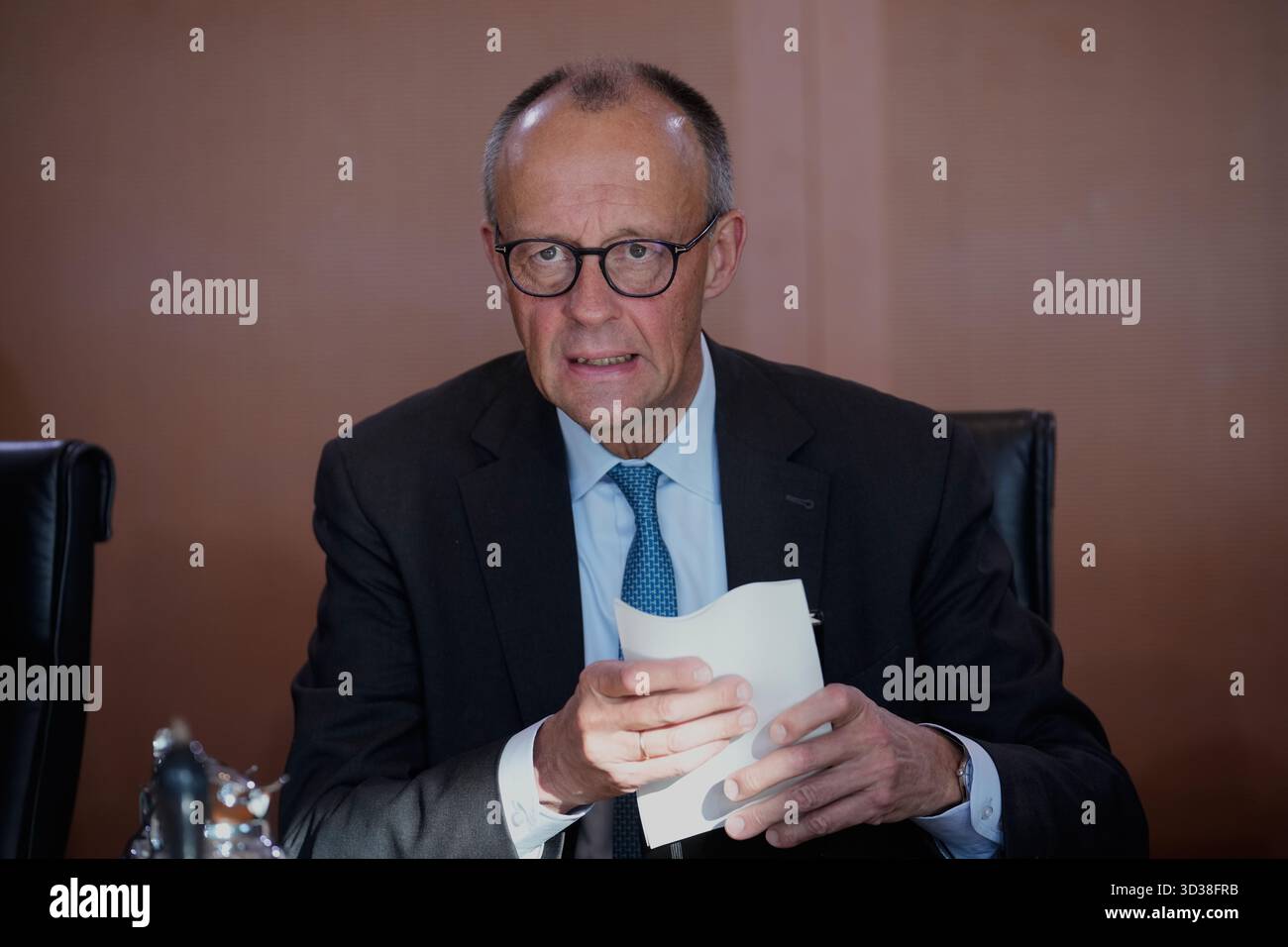 German Chancellor Friedrich Merz arrives for the cabinet meeting at the ...
