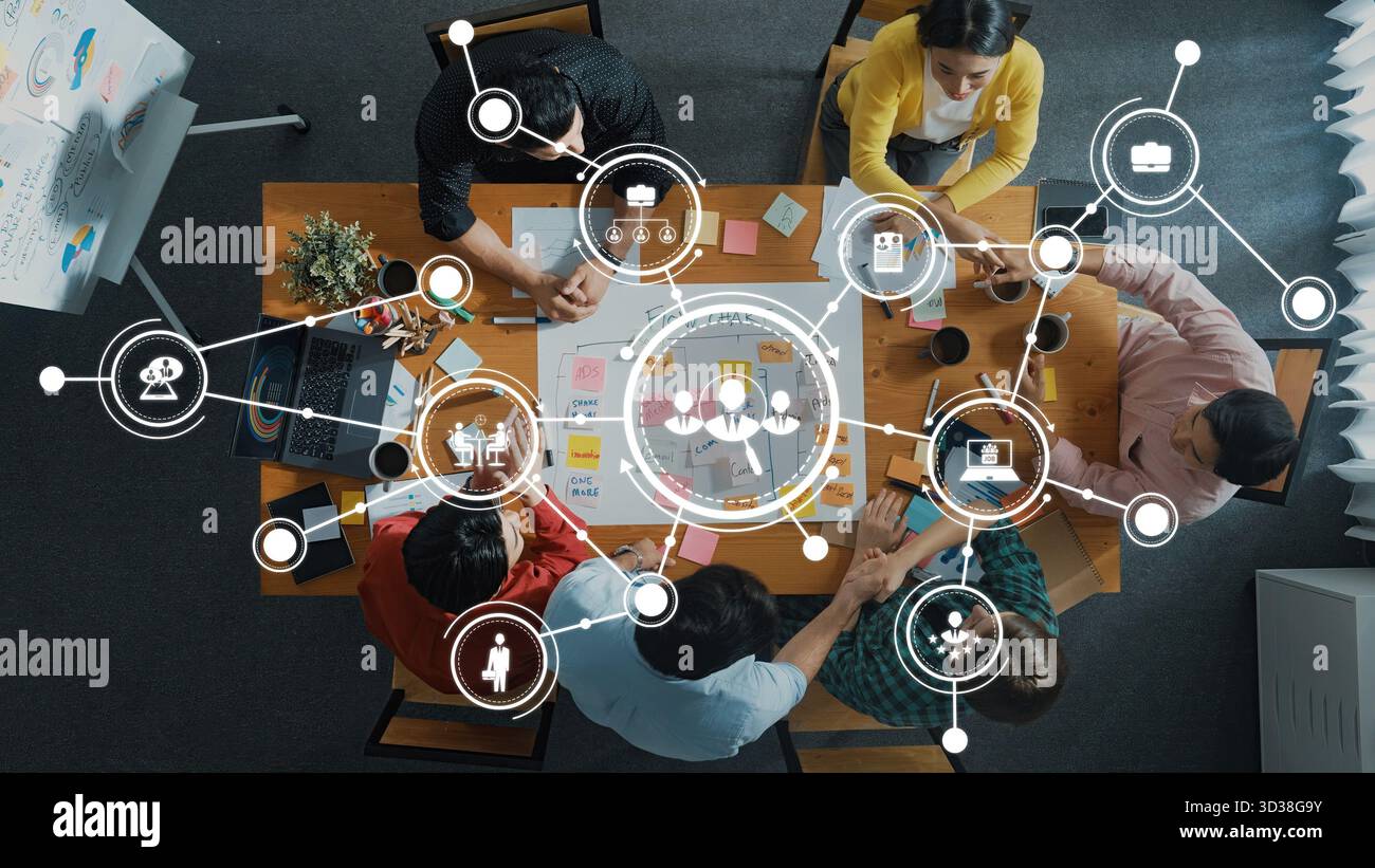 Aerial view of a diverse team engaged in collaborative brainstorming in ...
