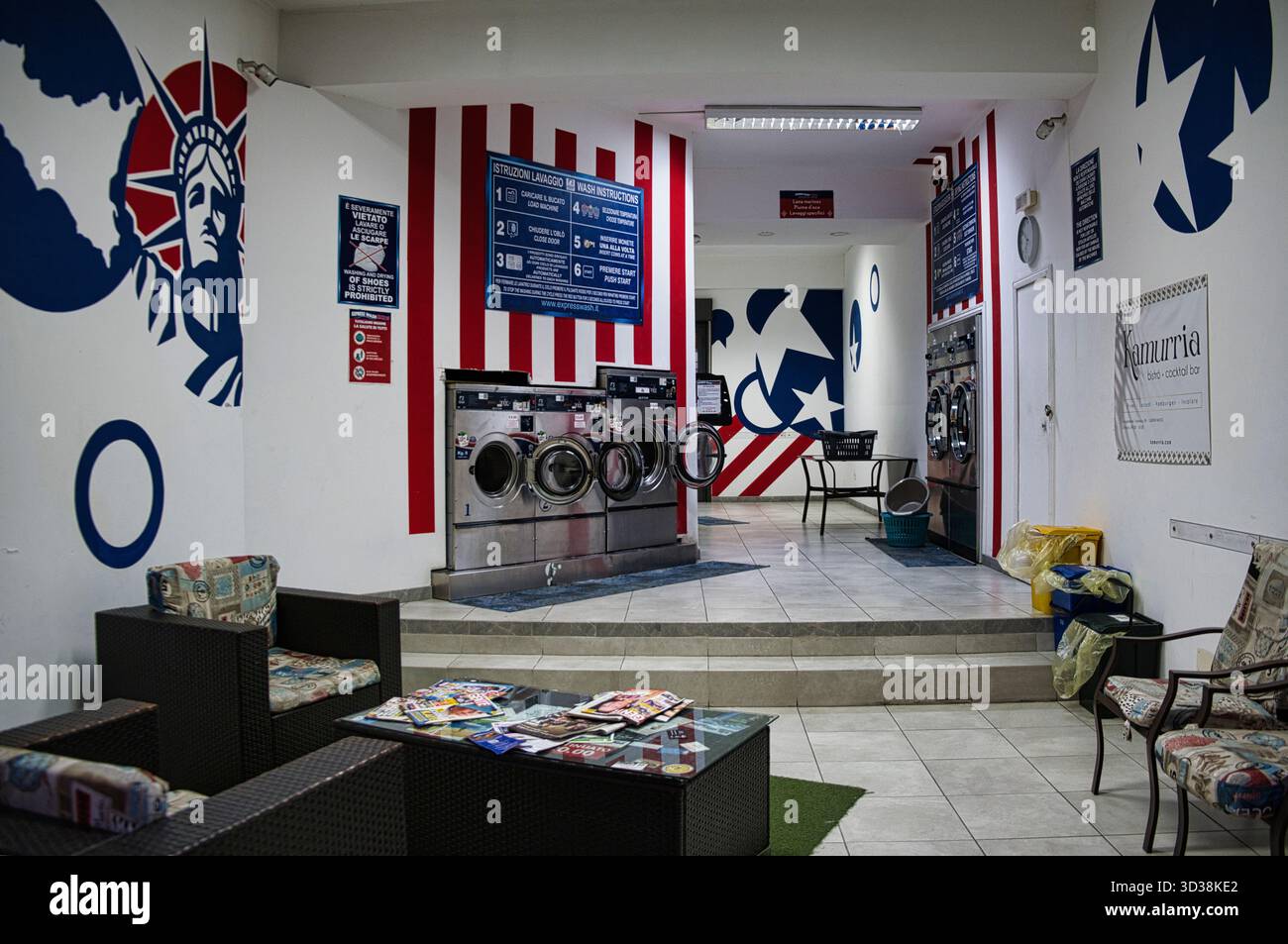 Public laundrette in Taormina, Sicily Stock Photo - Alamy
