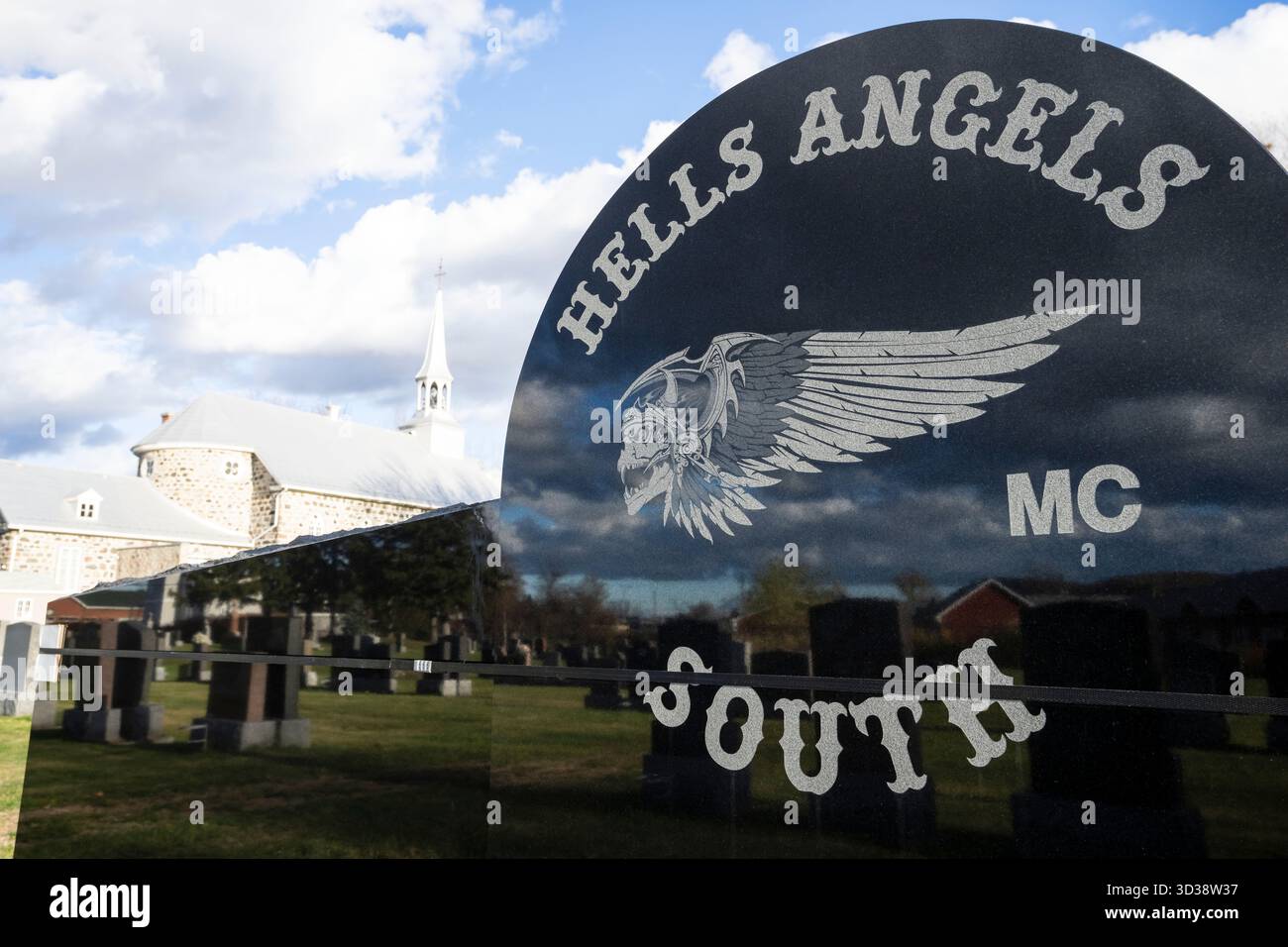 A marble headstone dedicated to the Hells Angels is seen at a cemetery ...