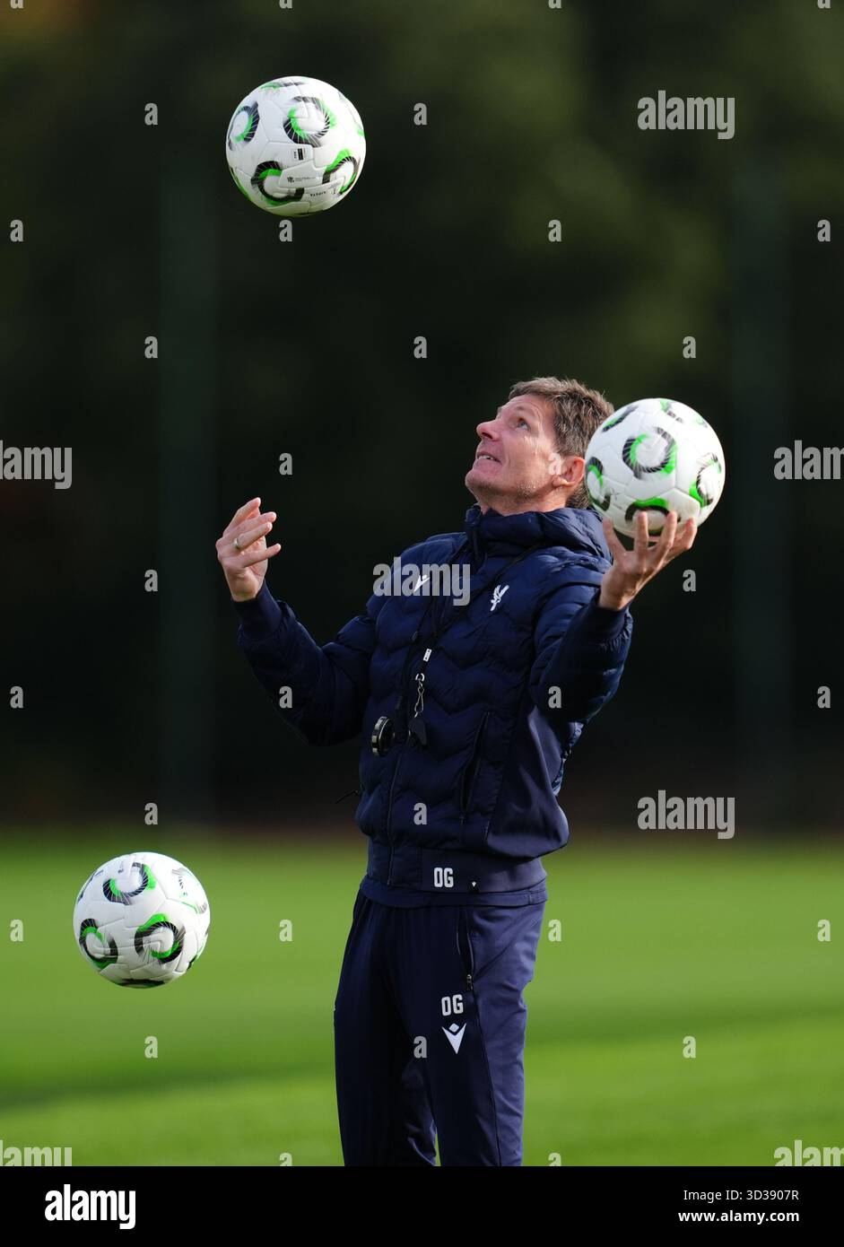 Crystal Palace manager Oliver Glasner juggling footballs during a ...