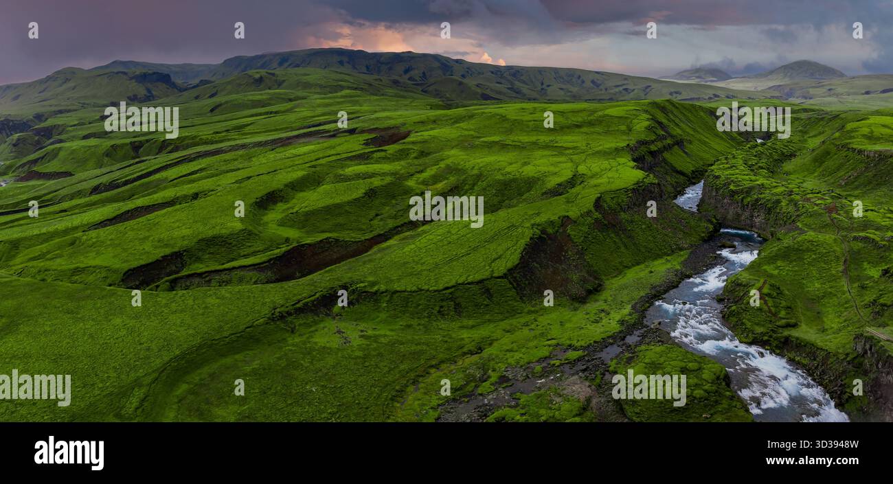 Aerial dusk view of Iceland highlands with lava field and river Stock ...