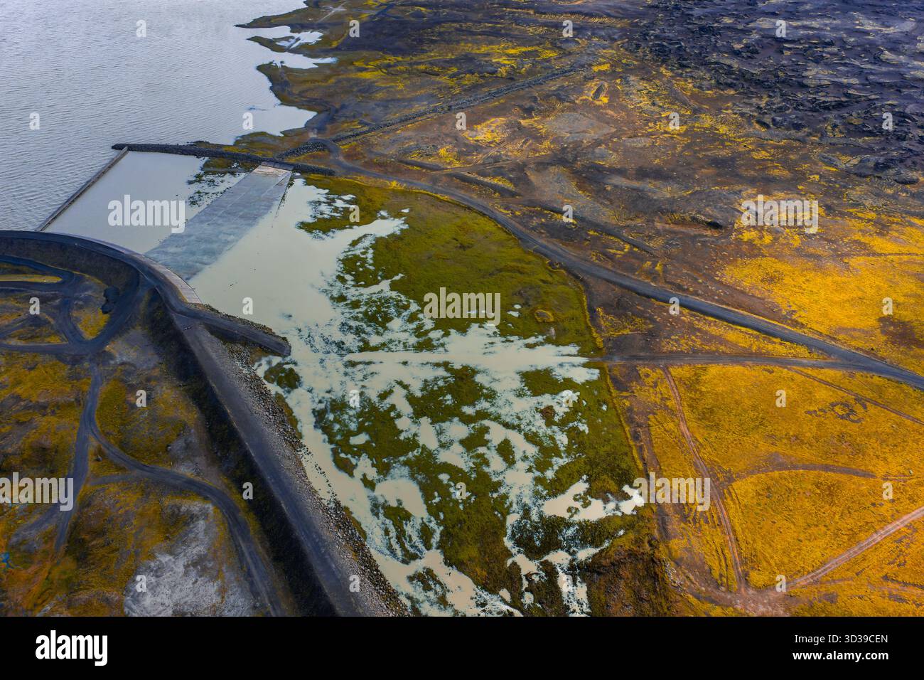 Aerial dam and spillway over lava fields in Icelandic highlands Stock ...