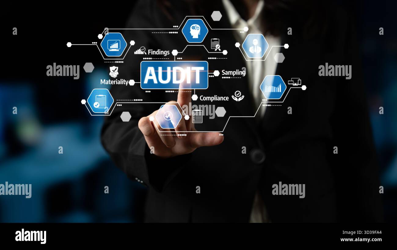 A business professional engages with digital icons representing audit ...