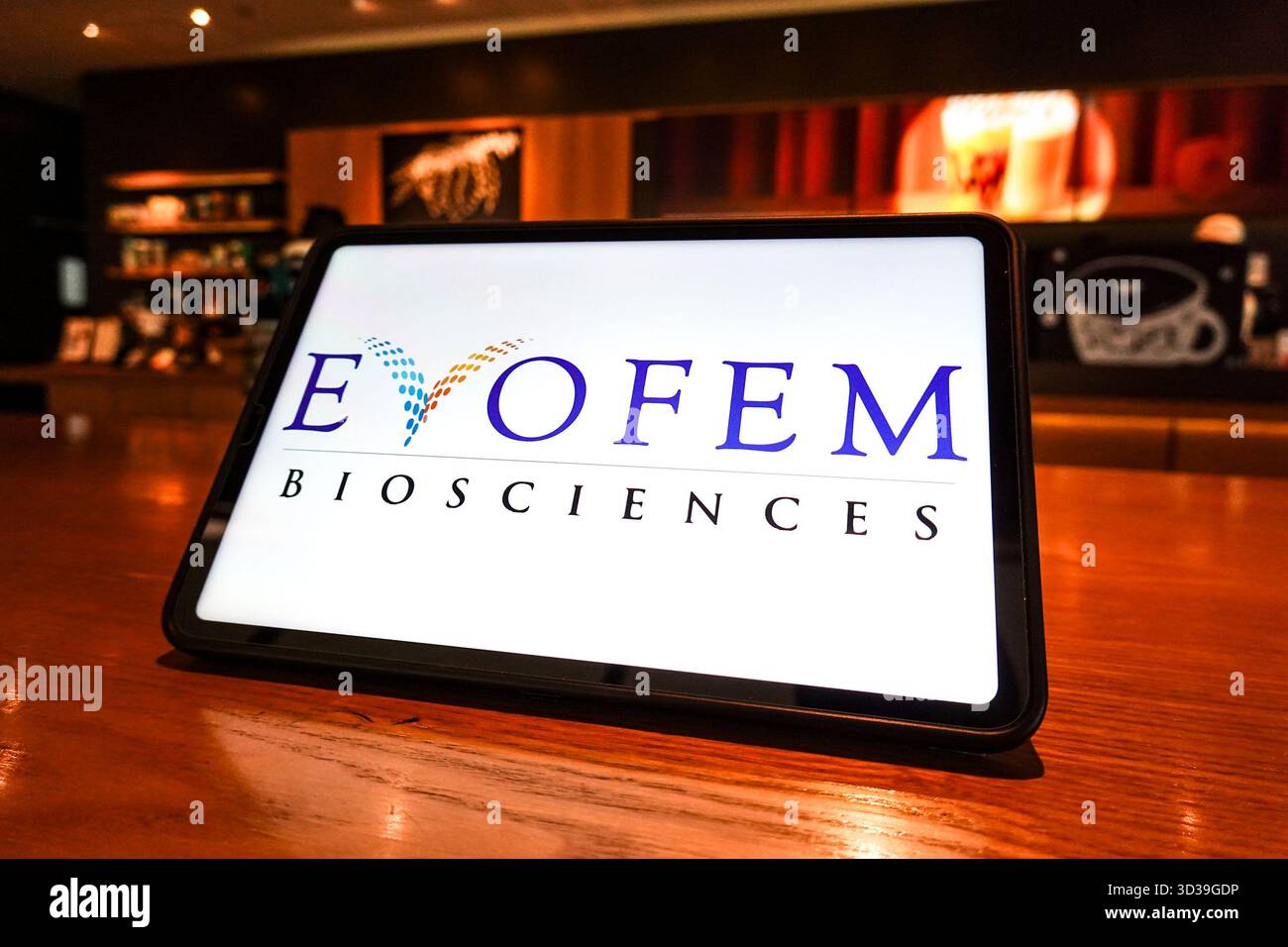 In this photo illustration, the Evofem Biosciences logo is displayed on the screen of a tablet ...