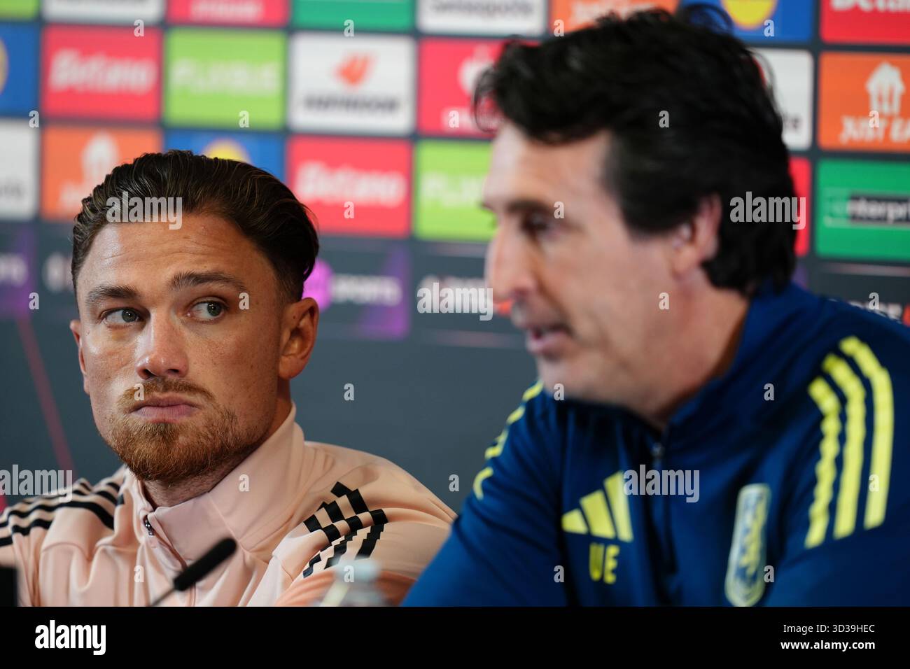 Aston Villa's Matty Cash (left) with manager Unai Emery during a press ...