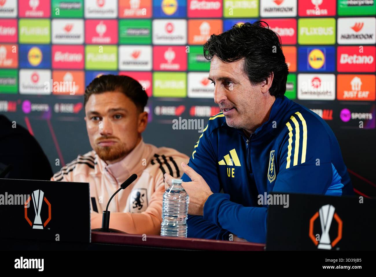 Aston villa manager unai emery (right) and matty cash during a press ...