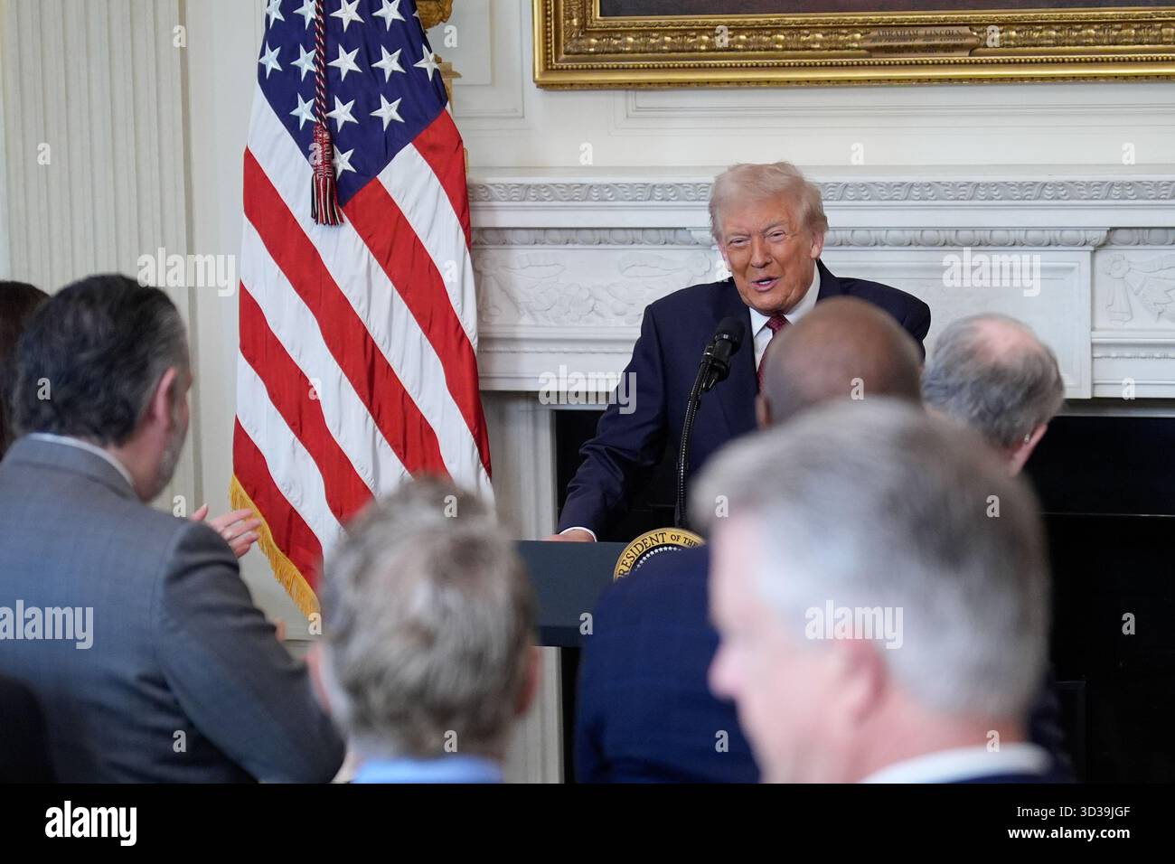 US President Donald Trump delivers remarks at the breakfast with ...