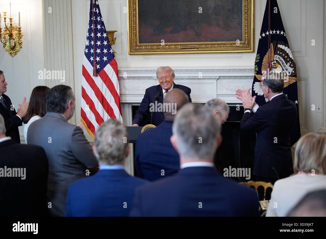US President Donald Trump delivers remarks at the breakfast with ...