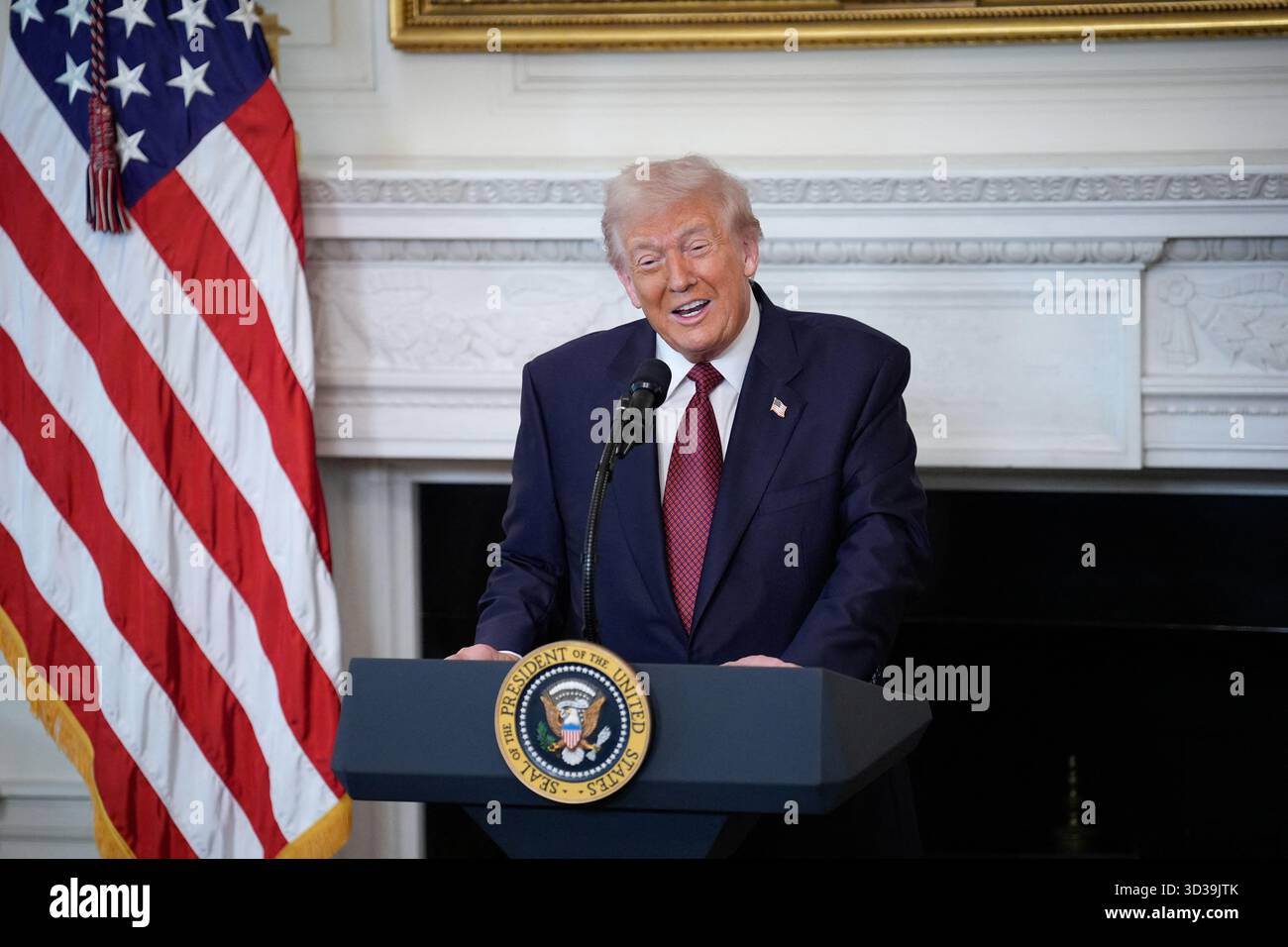 US President Donald Trump delivers remarks at the breakfast with ...