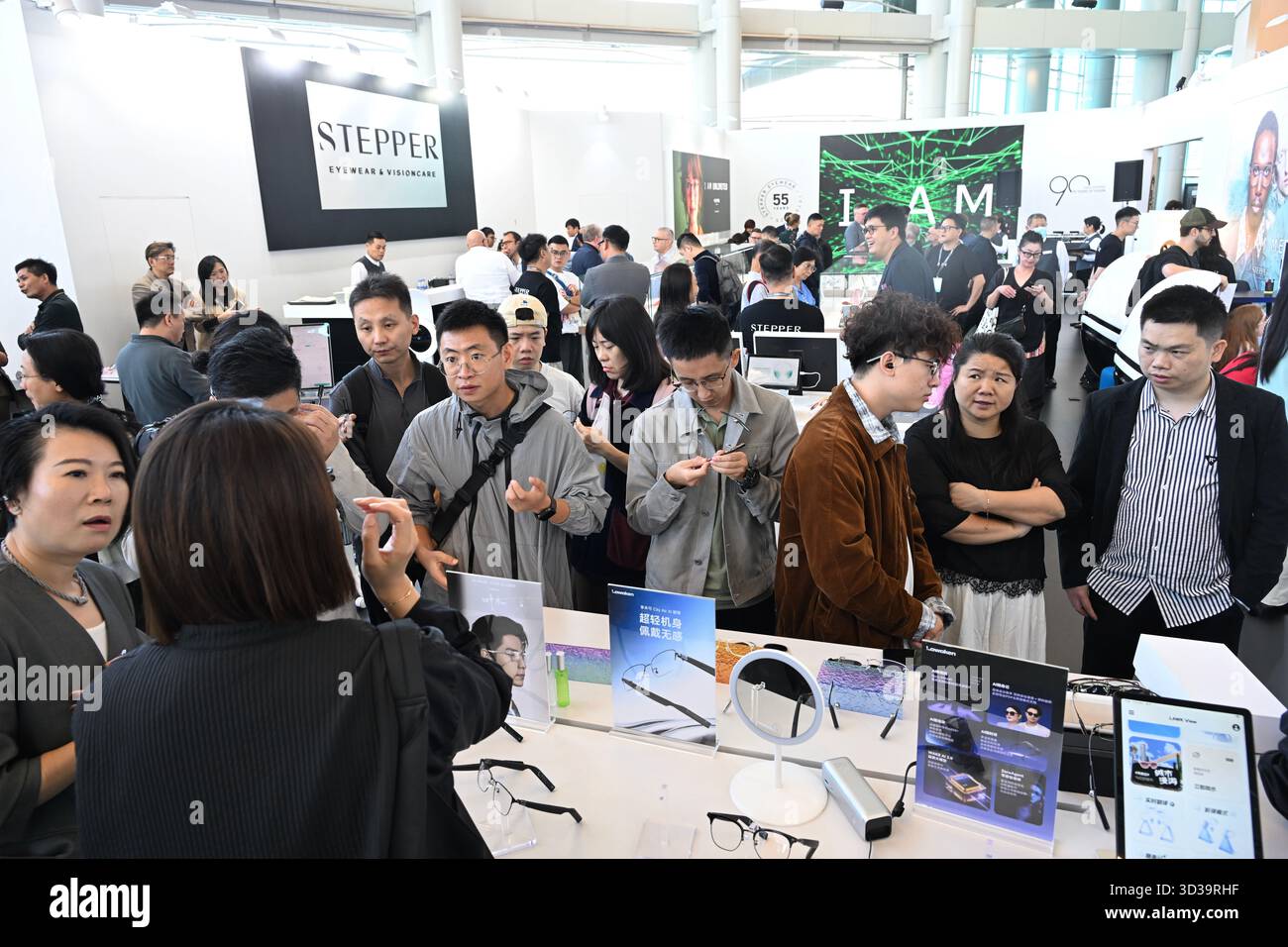 A general view showing the visitors watching the AI glasses in the Hong ...