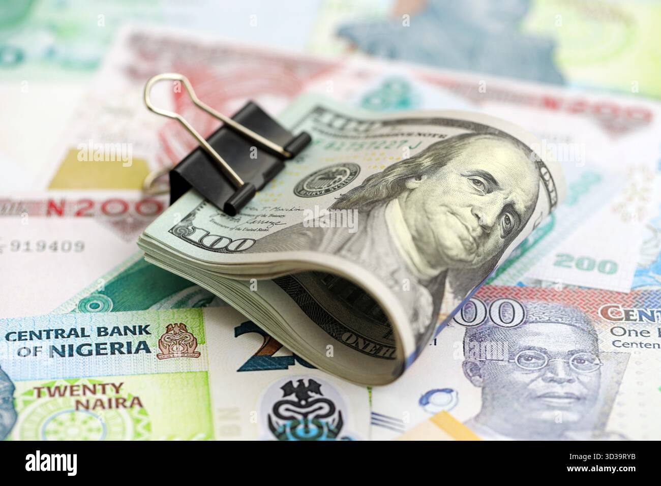 Nigerian naira currency money bills and bunch of us dollar banknotes ...